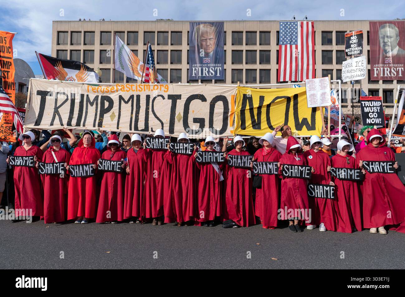 Demonstrators dressed as the TV series The Handmaid's Tale march to the ...