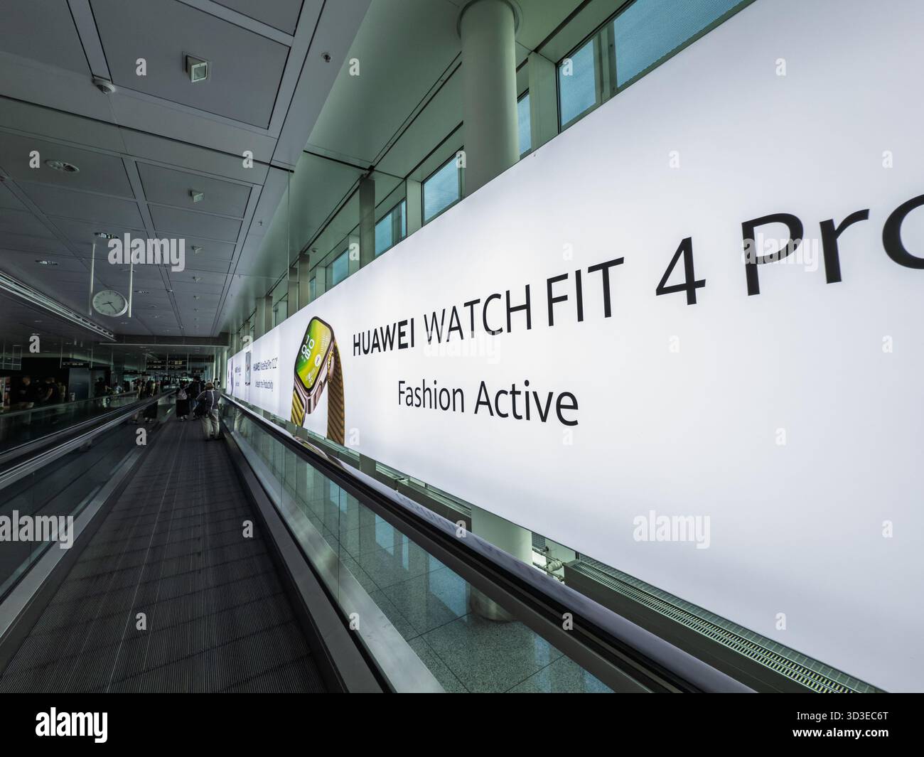 MUNICH, GERMANY - JUNE 21, 2025: Backlit airport billboard promoting ...