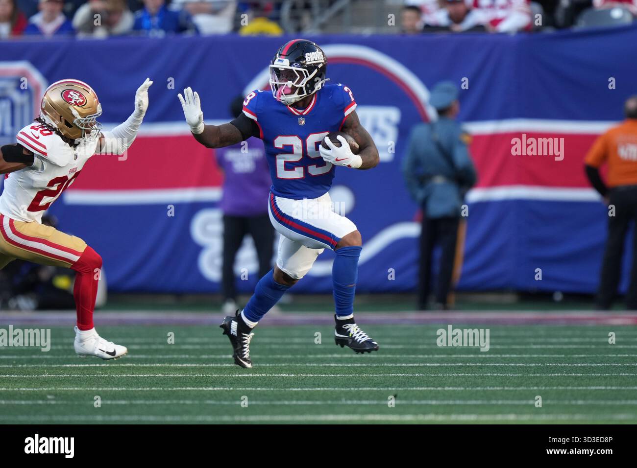 New York Giants running back Tyrone Tracy Jr. (29) runs after a catch ...