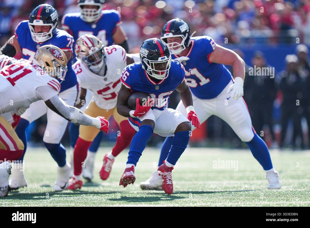 New York Giants running back Devin Singletary (26) rushes with the ball ...