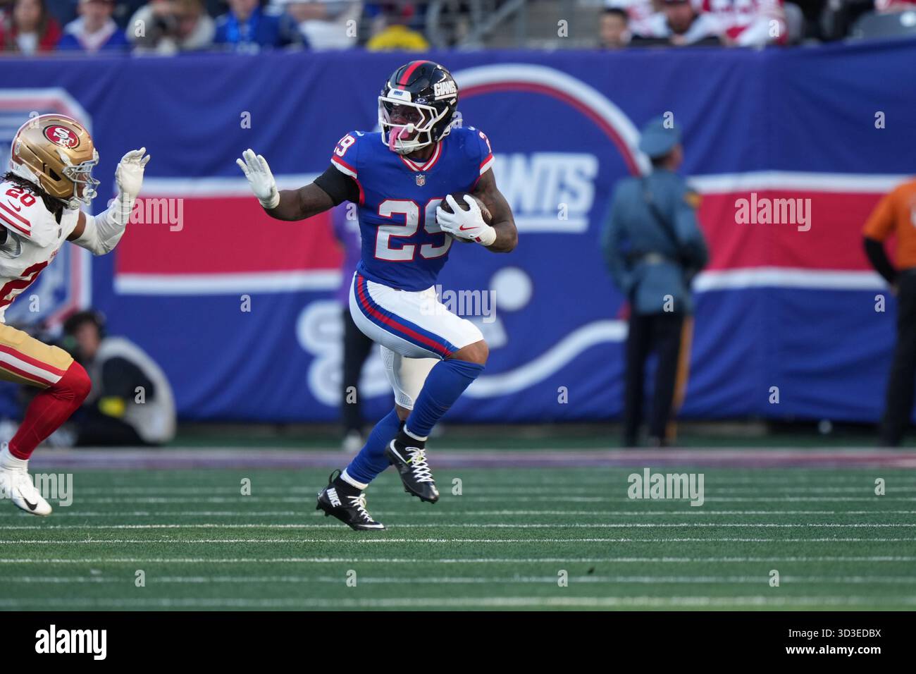 New York Giants running back Tyrone Tracy Jr. (29) runs after a catch ...