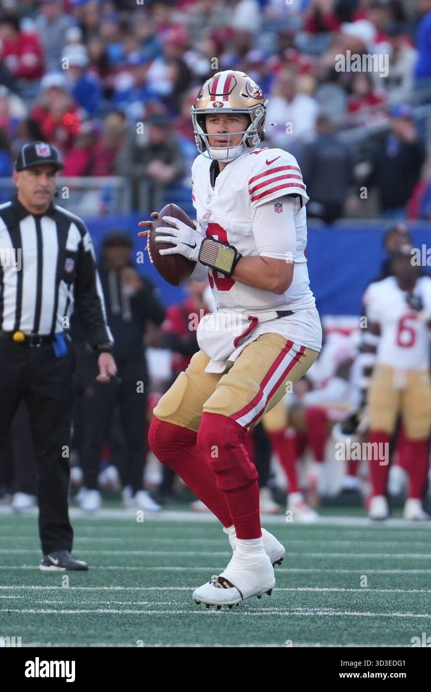 San Francisco 49ers quarterback Mac Jones (10) looks for a receiver ...