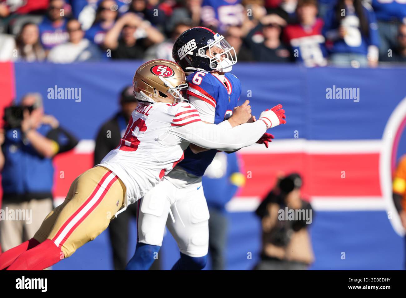 New York Giants quarterback Jaxson Dart (6) gets sacked from behind by ...