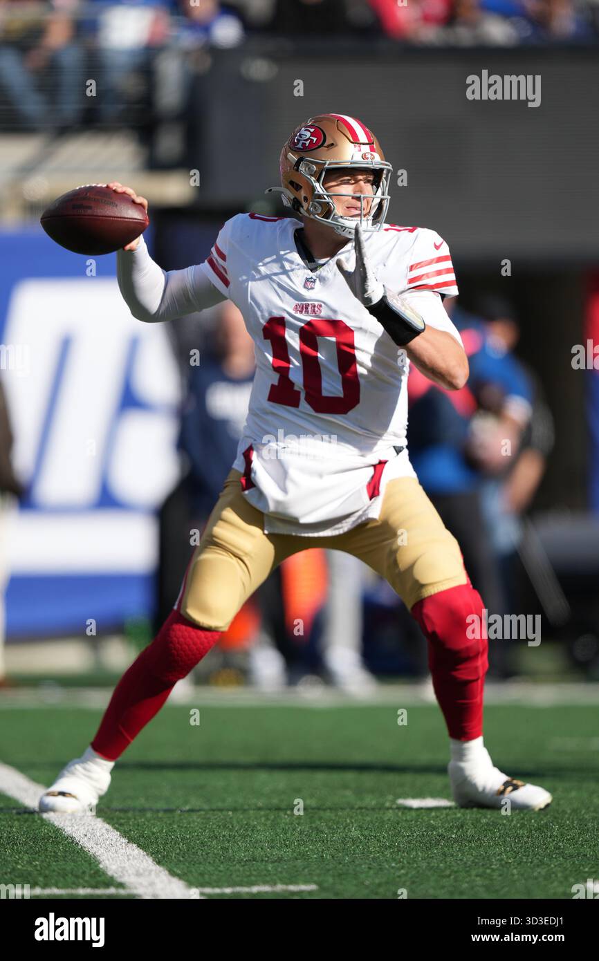 San Francisco 49ers quarterback Mac Jones (10) makes a pass attempt ...