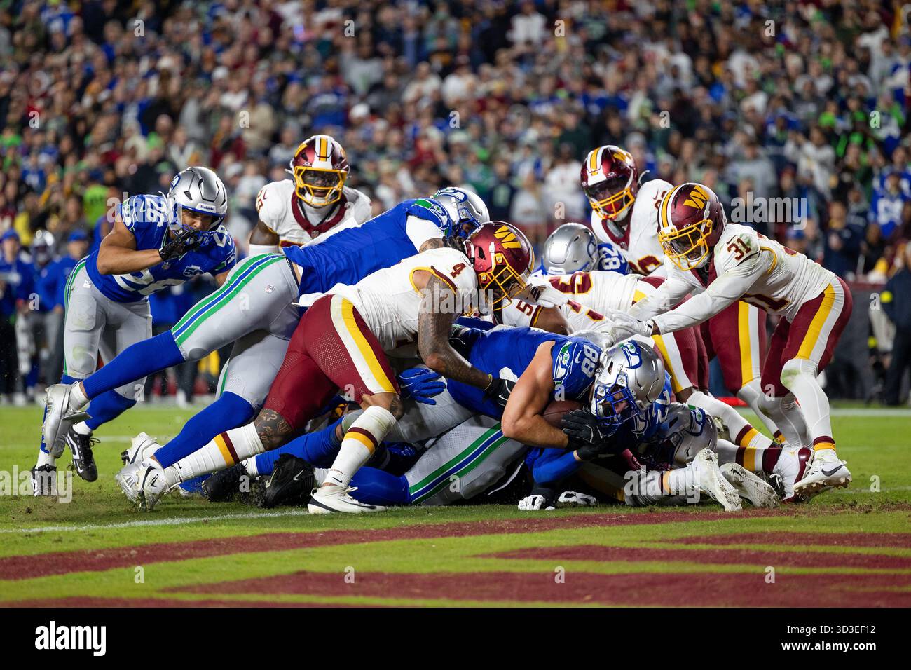 Seattle Seahawks tight end AJ Barner (88) dives into the end zone and ...