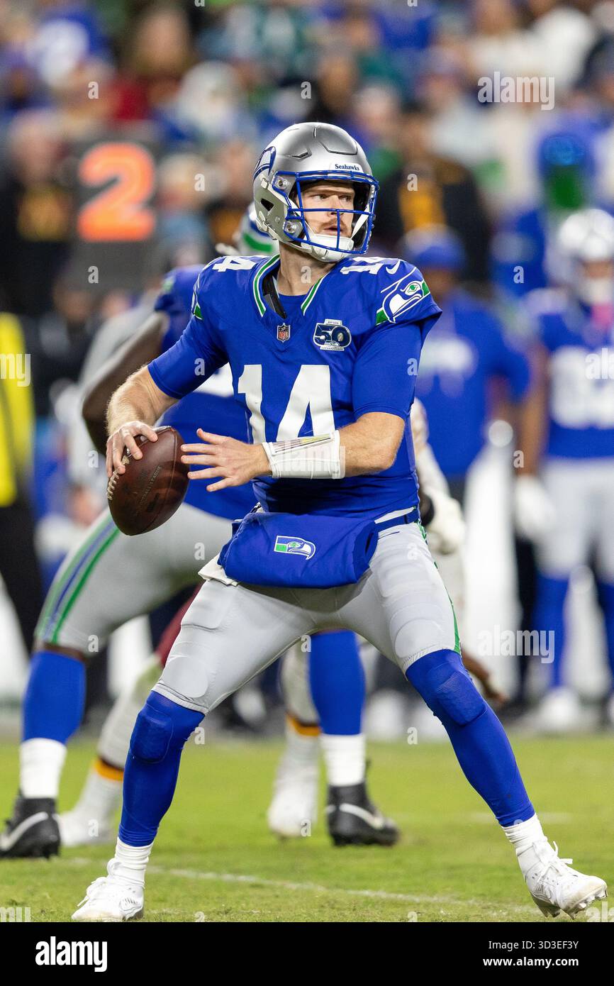 Seattle Seahawks quarterback Sam Darnold (14) drops back to pass during ...