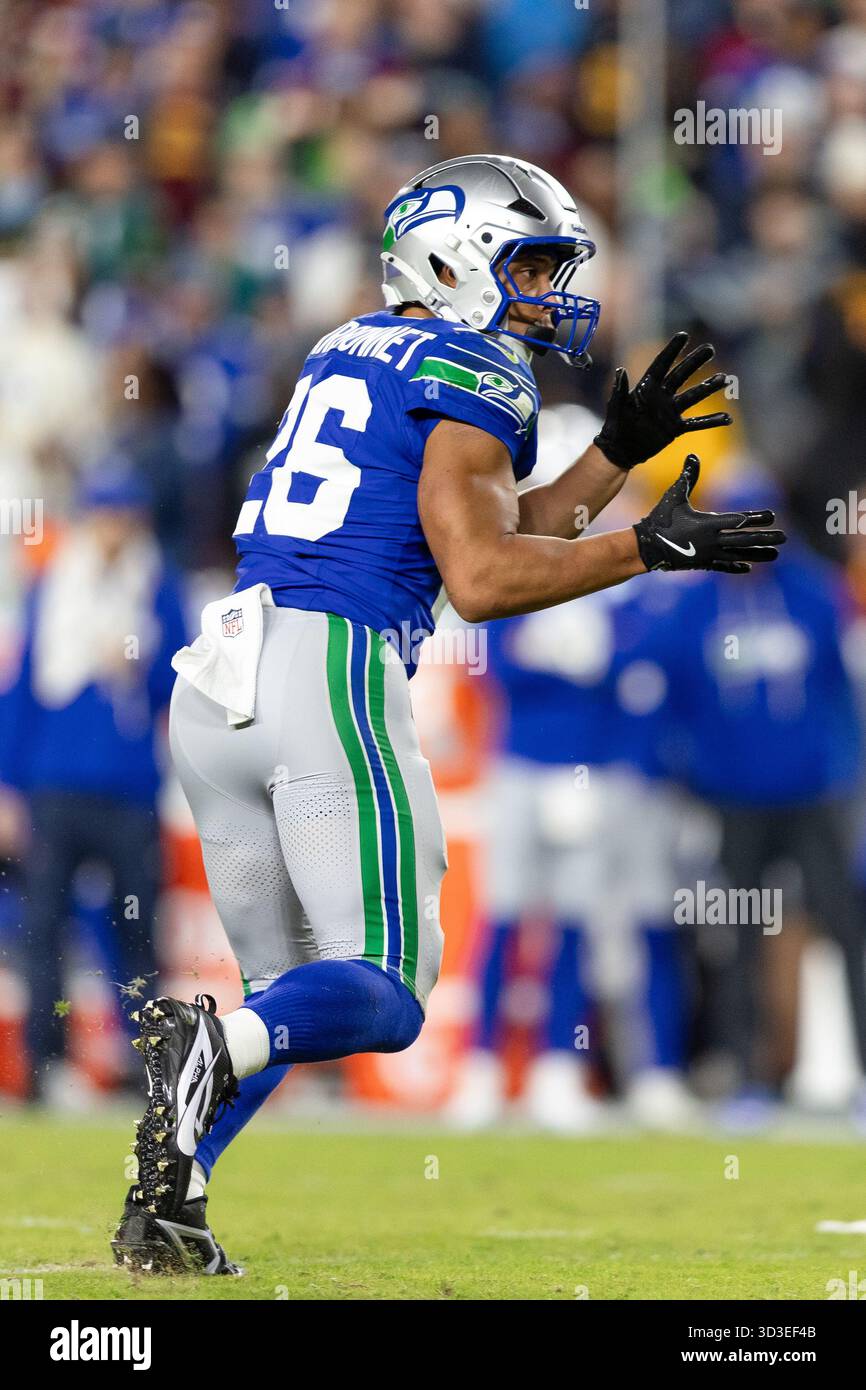 Seattle Seahawks running back Zach Charbonnet (26) readies to receive ...