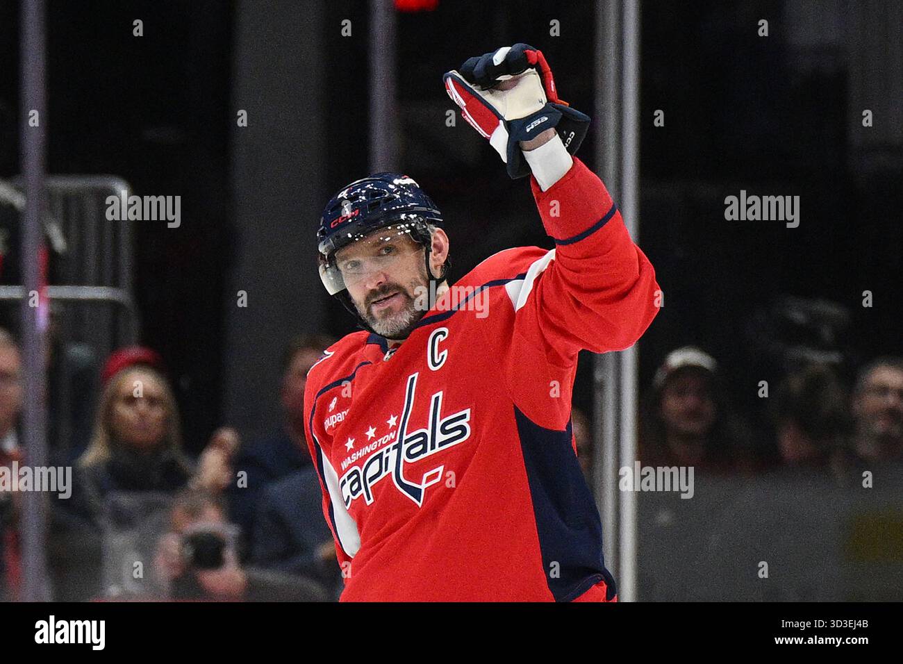 Washington Capitals left wing Alex Ovechkin (8) celebrates his 900th ...