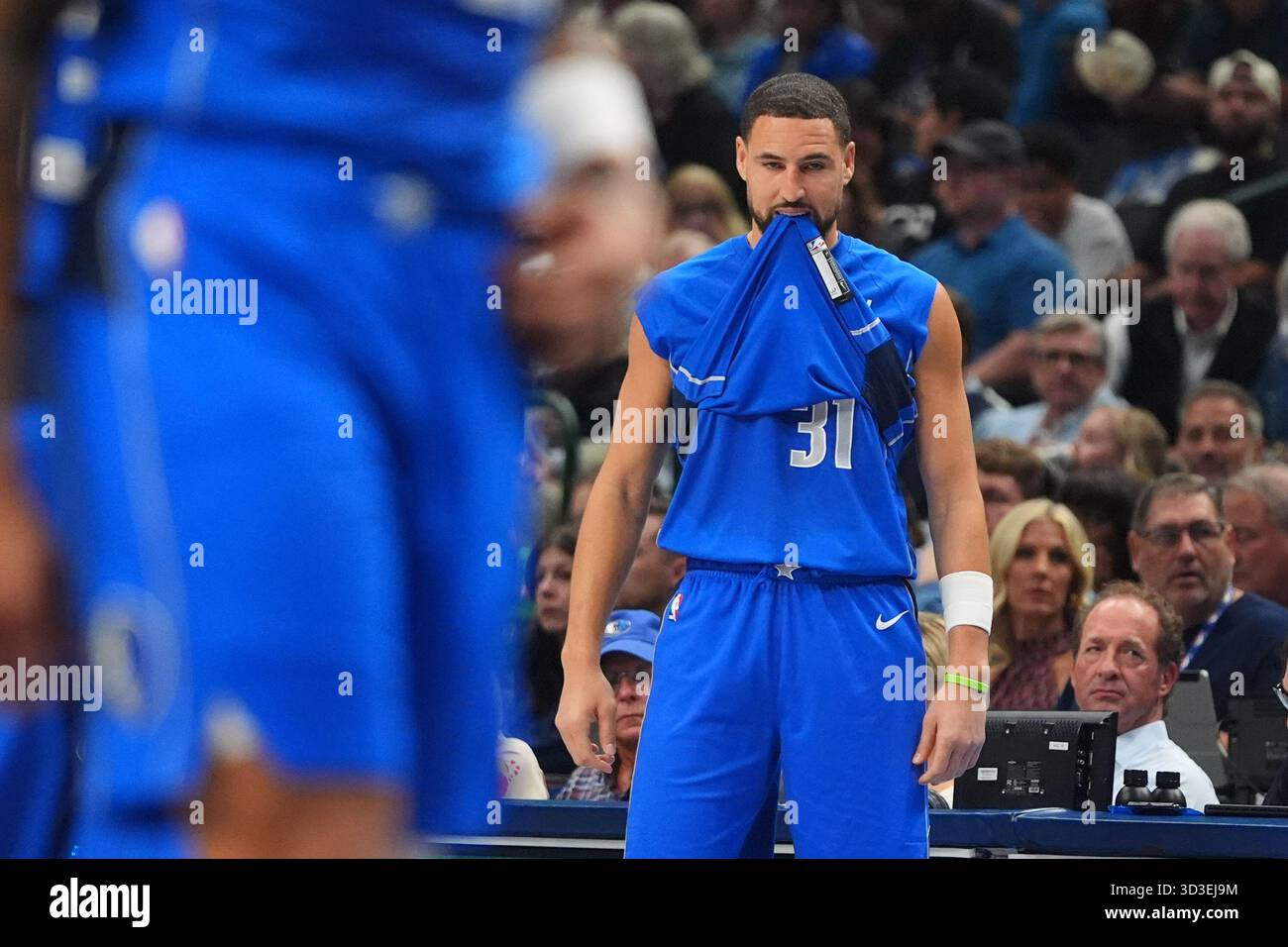 Dallas Mavericks guard Klay Thompson waits to enter the game from the ...