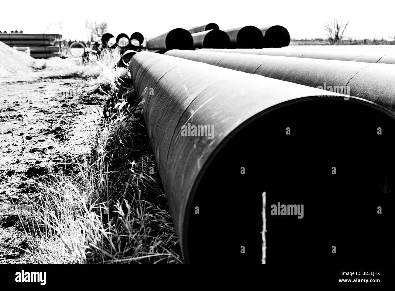 Metal pipes lined up Black and White Stock Photos & Images - Alamy