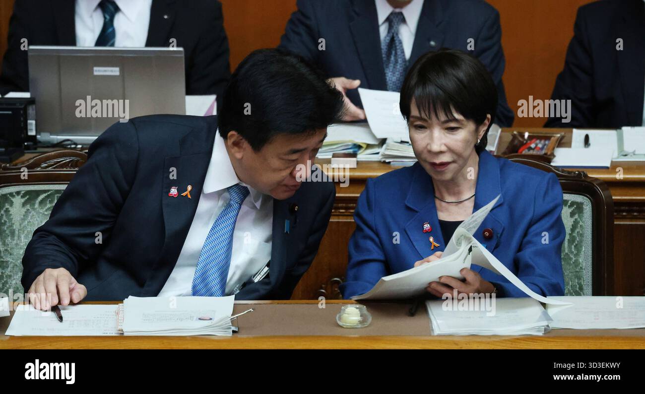 Japanese Prime Minister Sanae Takaichi (R) and Chief Cabinet Secretary ...