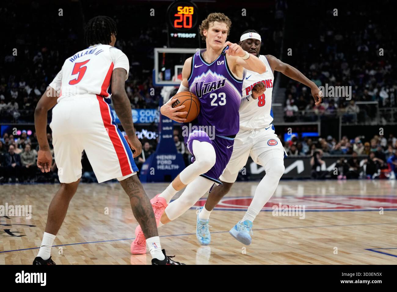 Utah Jazz forward Lauri Markkanen, center, drives against Detroit ...
