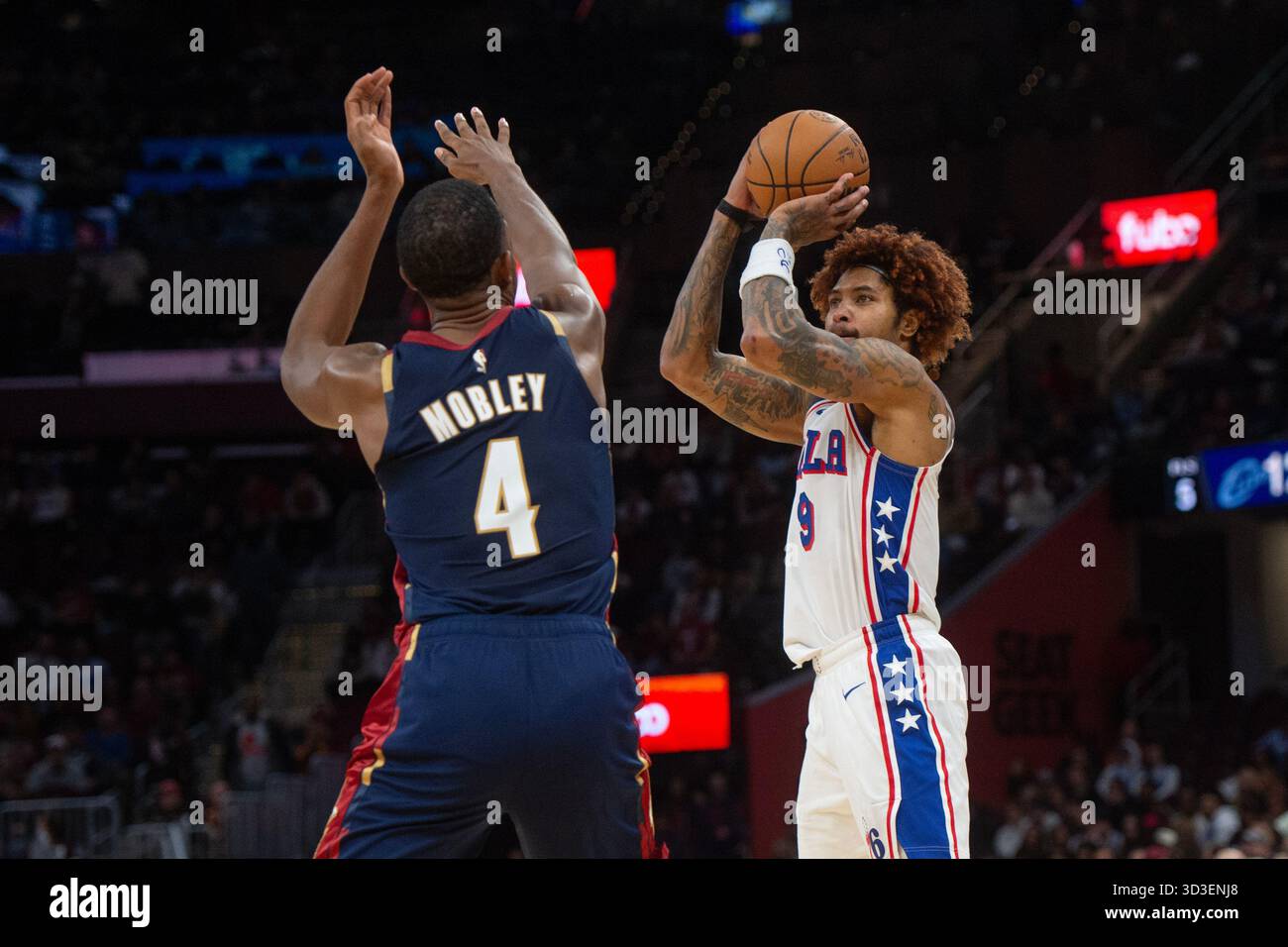 Philadelphia 76ers' Kelly Oubre Jr. (9) shoots over Cleveland Cavaliers ...