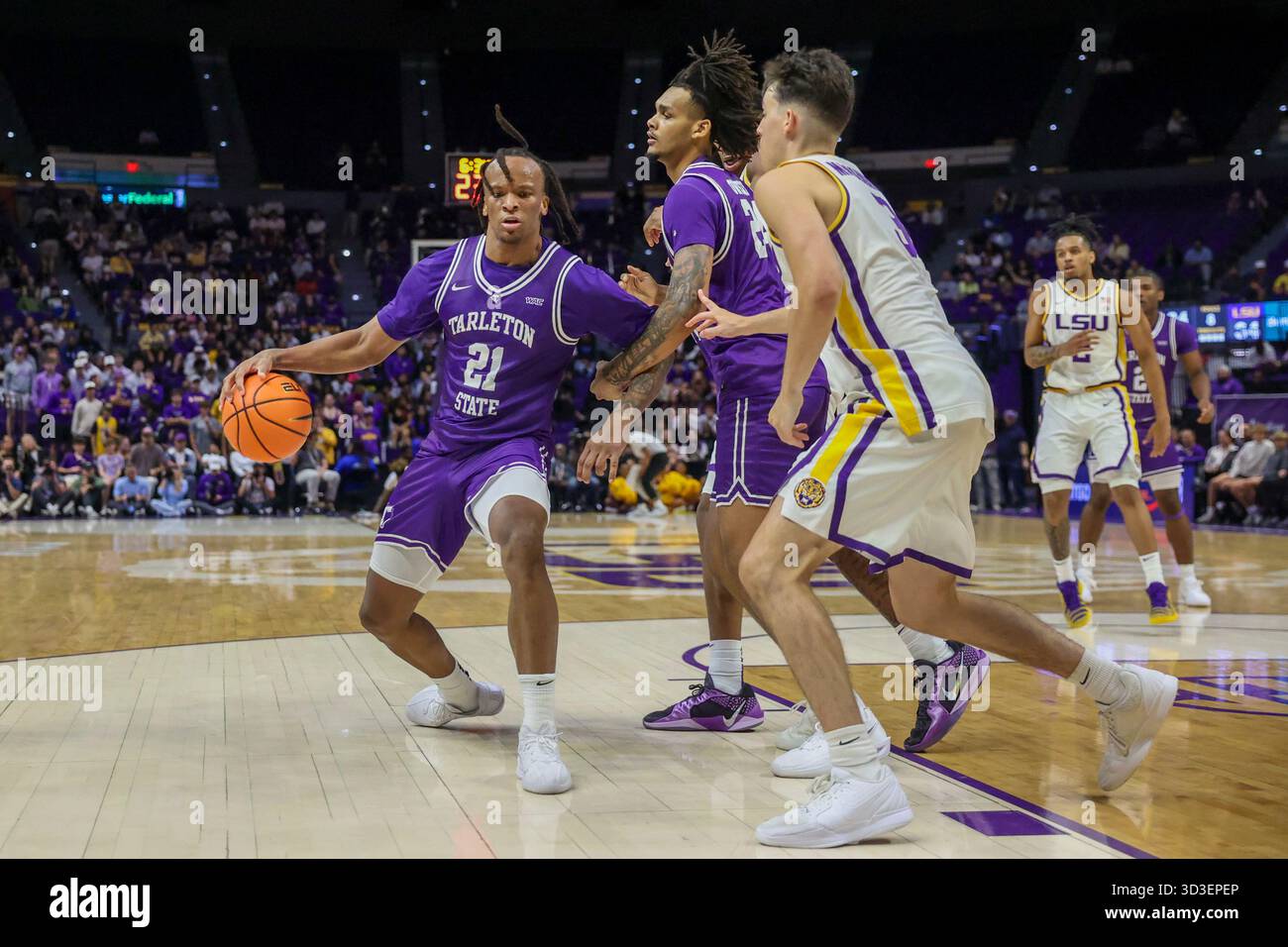 Tarleton State Texans forward Freddy Hicks (21) tries to drive to the ...