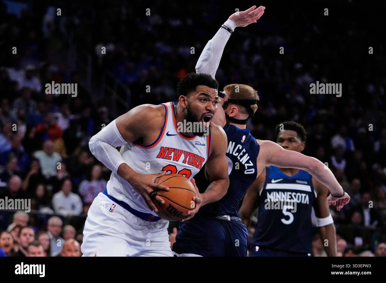 New York Knicks' Karl-Anthony Towns, left, drives past Minnesota ...