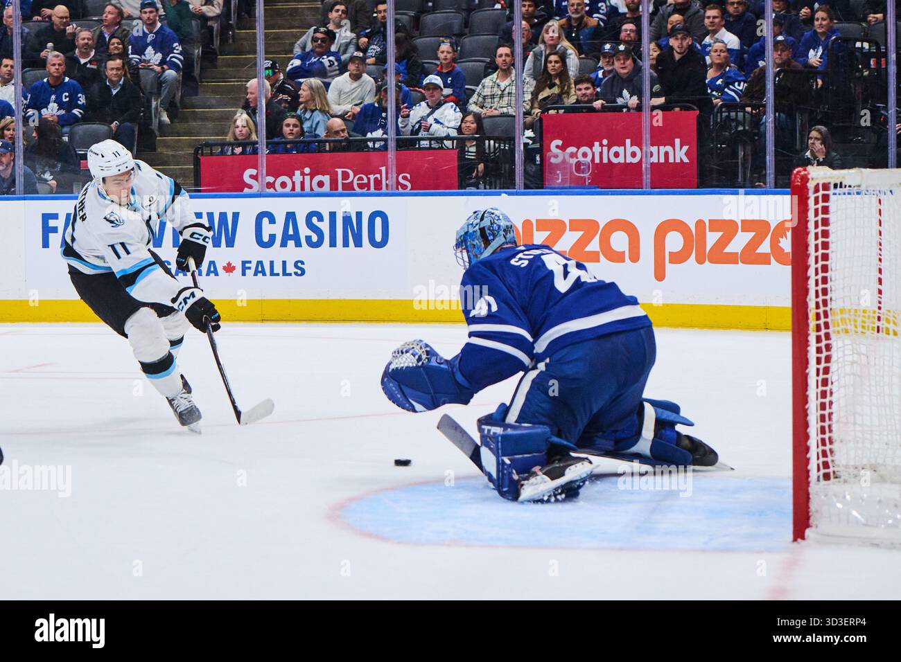 Utah Mammoth's Dylan Guenther (11) scores on Toronto Maple Leafs ...