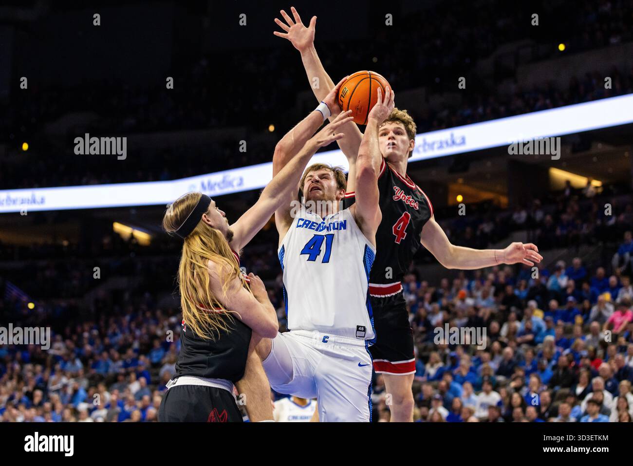 Creighton forward Isaac Traudt (41) goes up for a shot against South ...