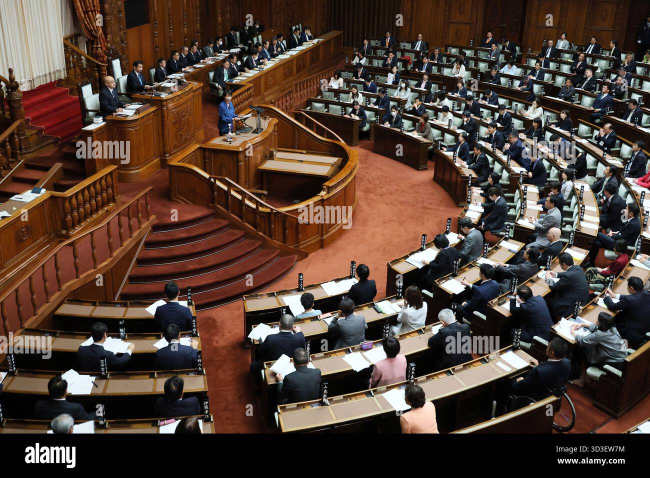 Japanese Prime Minister Sanae Takaichi answers a representative ...