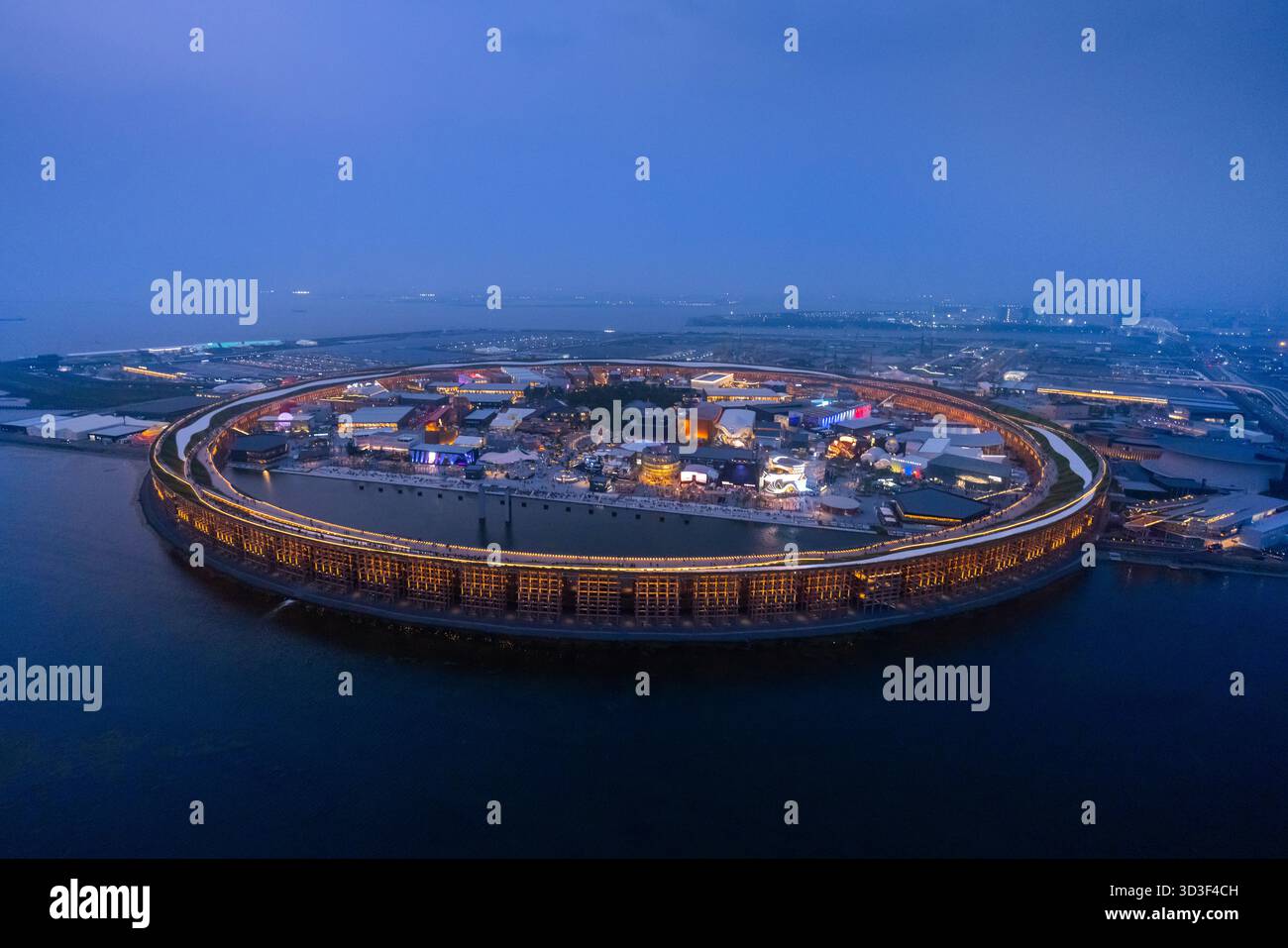 Aerial view of Expo 2025 Osaka Japan at dusk, night on Yumeshima Island ...