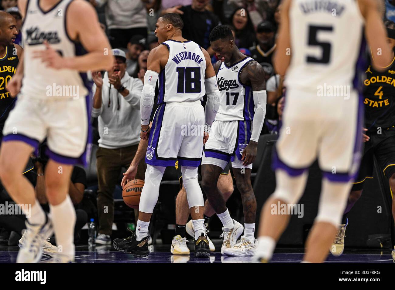 Sacramento Kings guard Russell Westbrook (18) and teammate Dennis ...