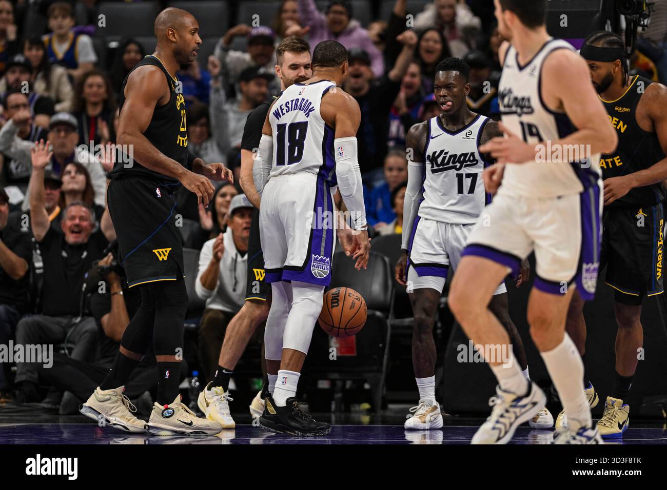 Sacramento Kings guard Russell Westbrook (18) and teammate Dennis ...