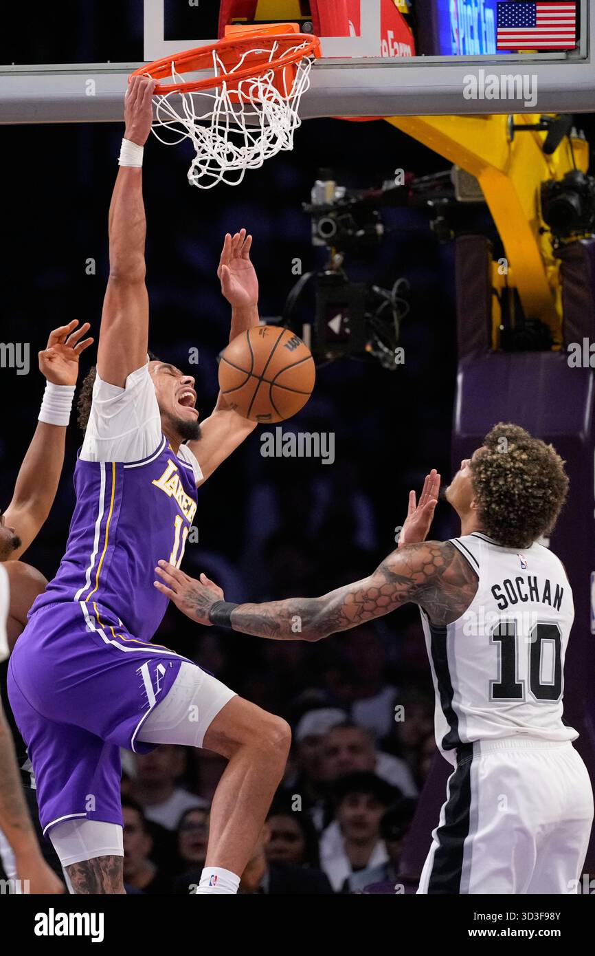 Los Angeles Lakers center Jaxson Hayes, left, dunks as San Antonio ...