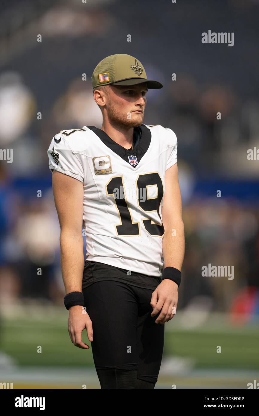 New Orleans Saints place kicker Blake Grupe (19) walks on the field ...
