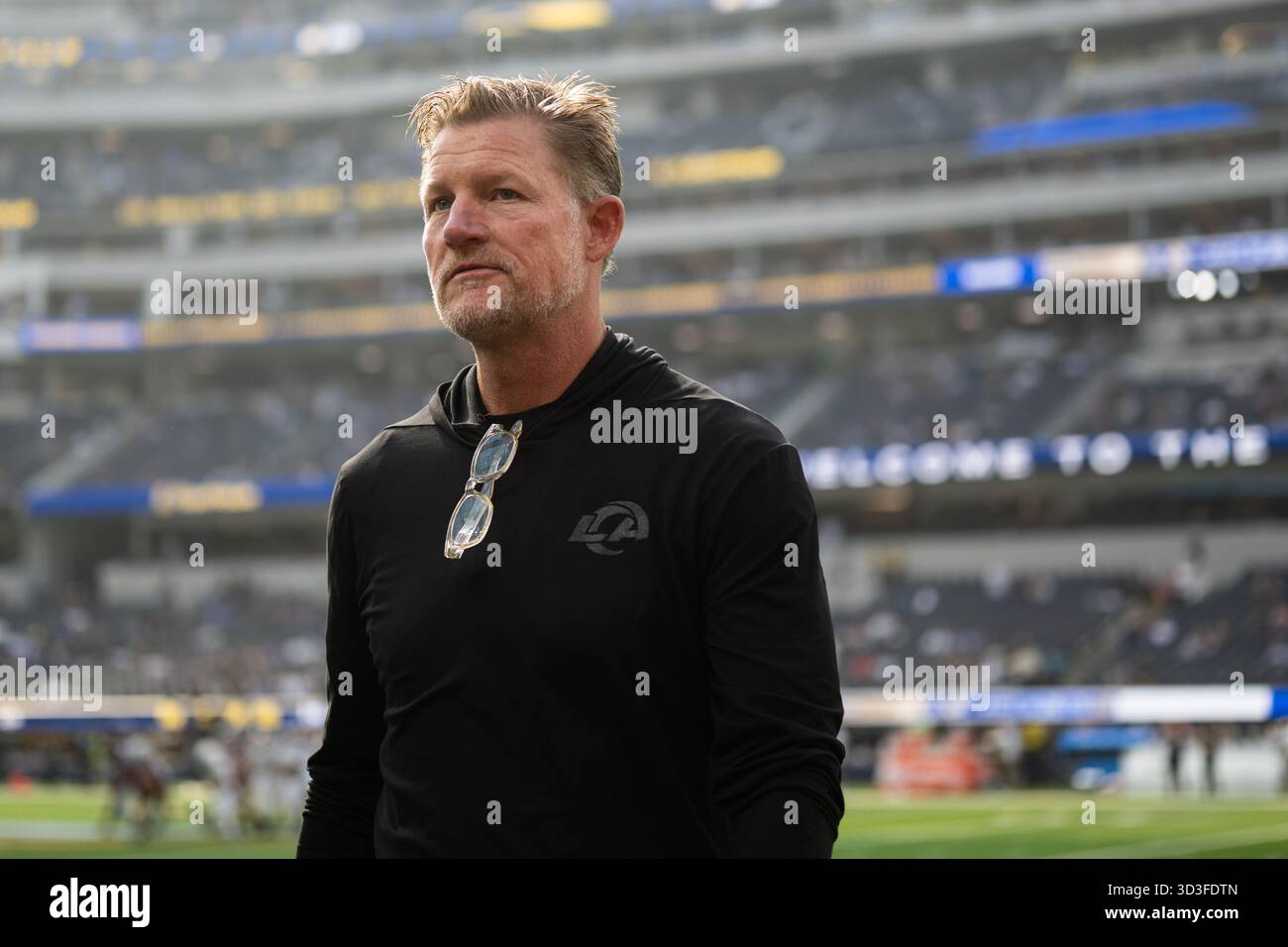 Los Angeles Rams general manager Les Snead walks back to the locker ...