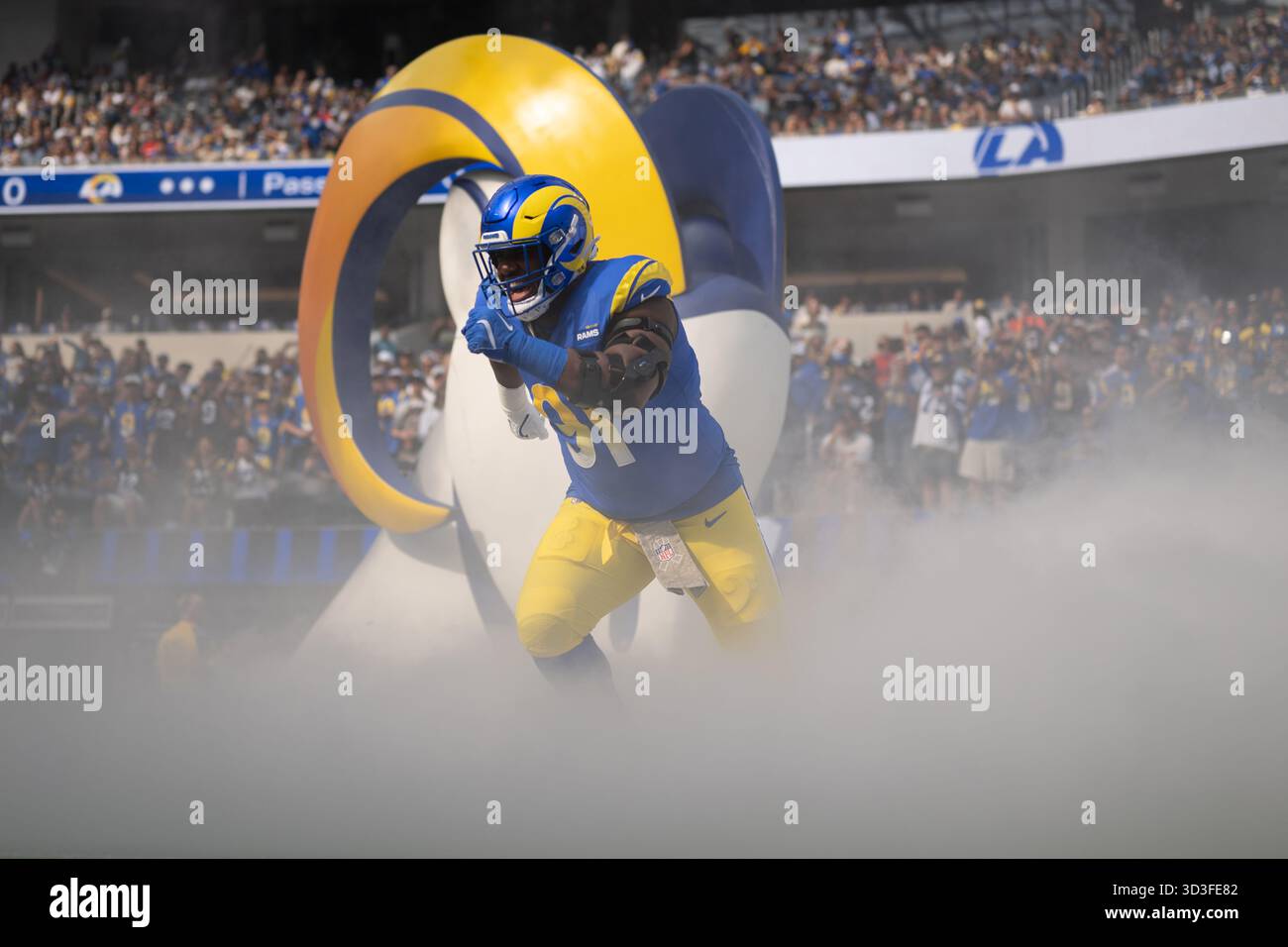 Los Angeles Rams defensive end Kobie Turner (91) enters the field ...