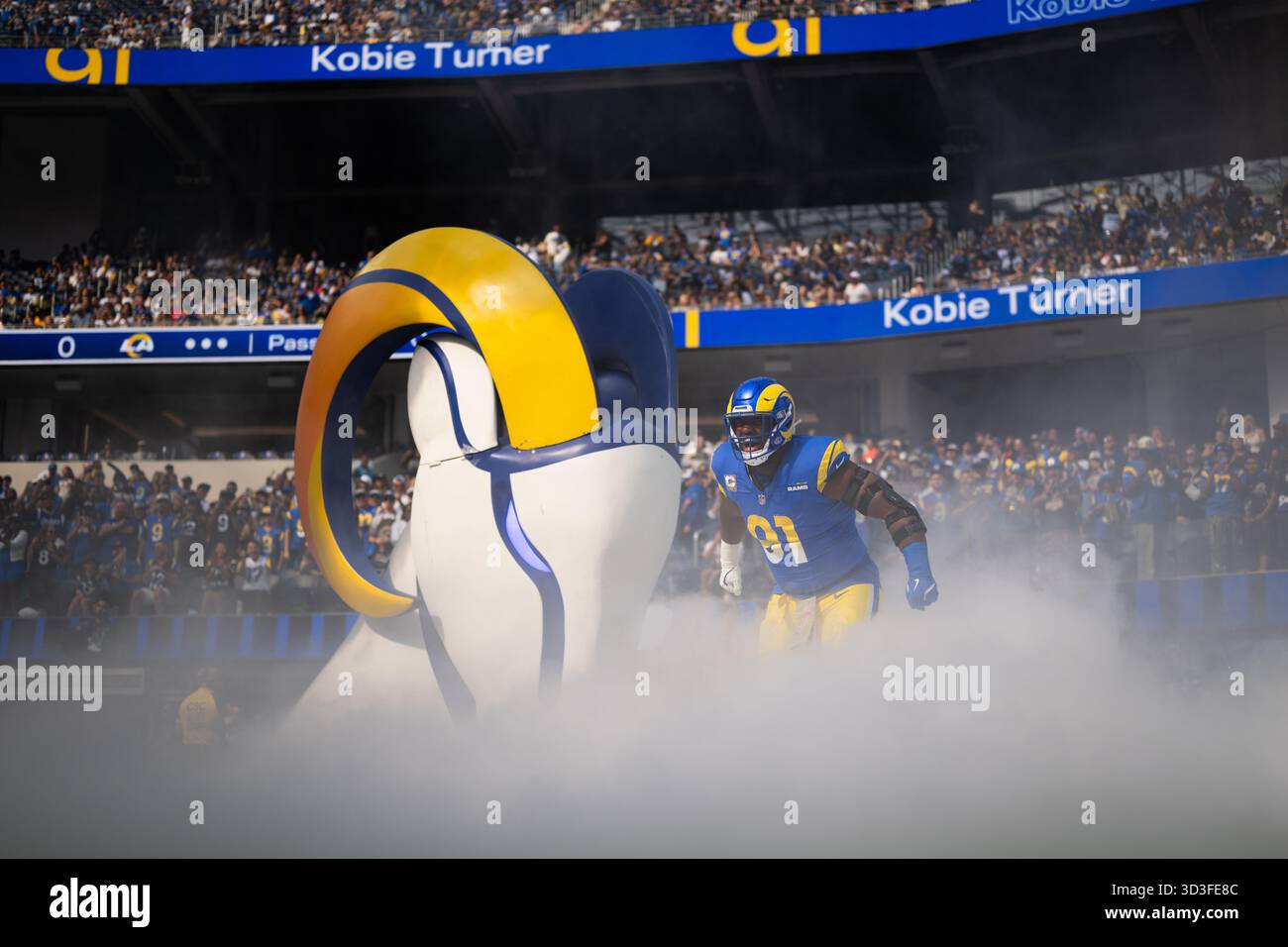 Los Angeles Rams defensive end Kobie Turner (91) enters the field ...