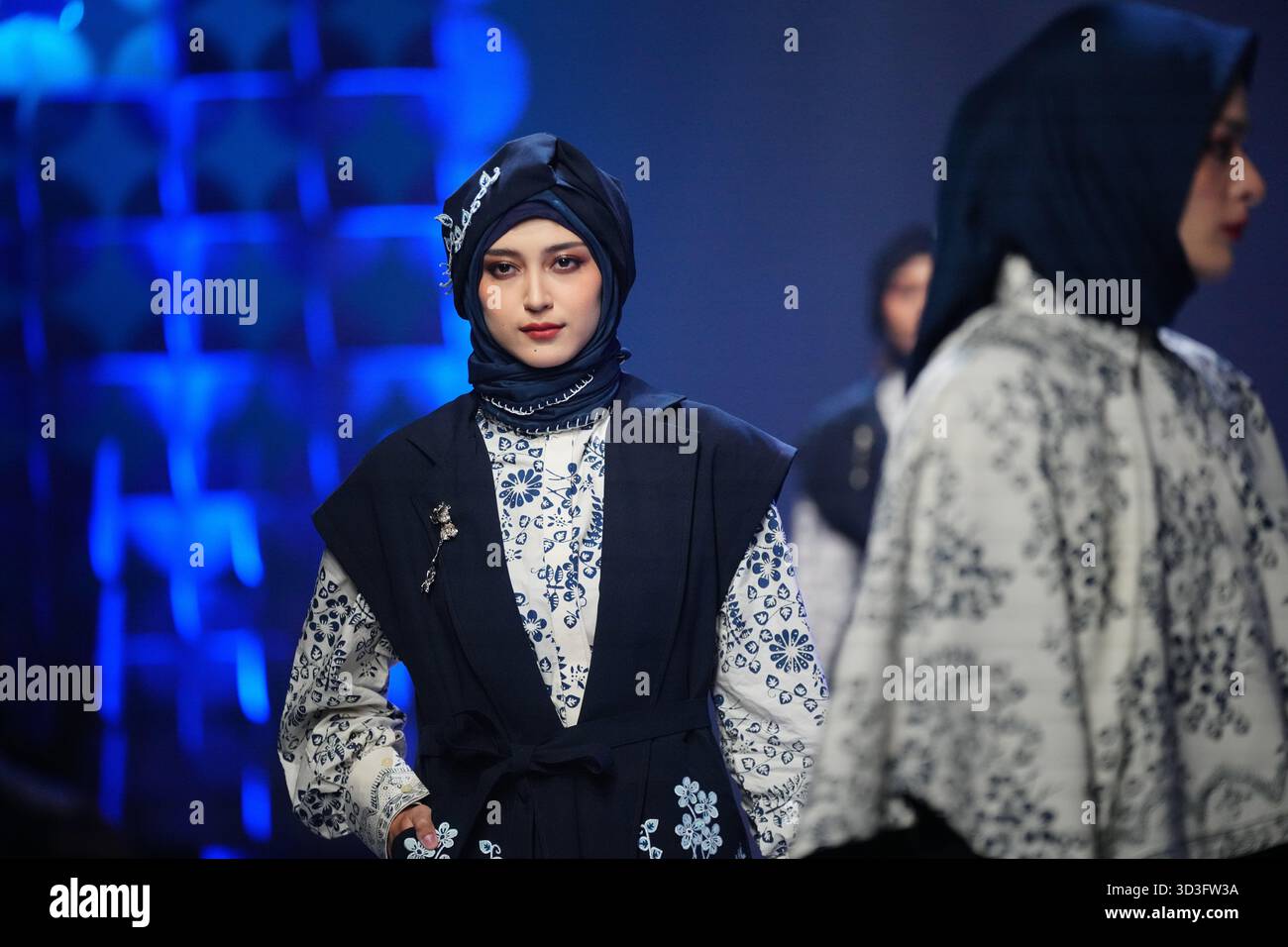 Models present a creation by Indonesian fashion designer Dama Kara ...