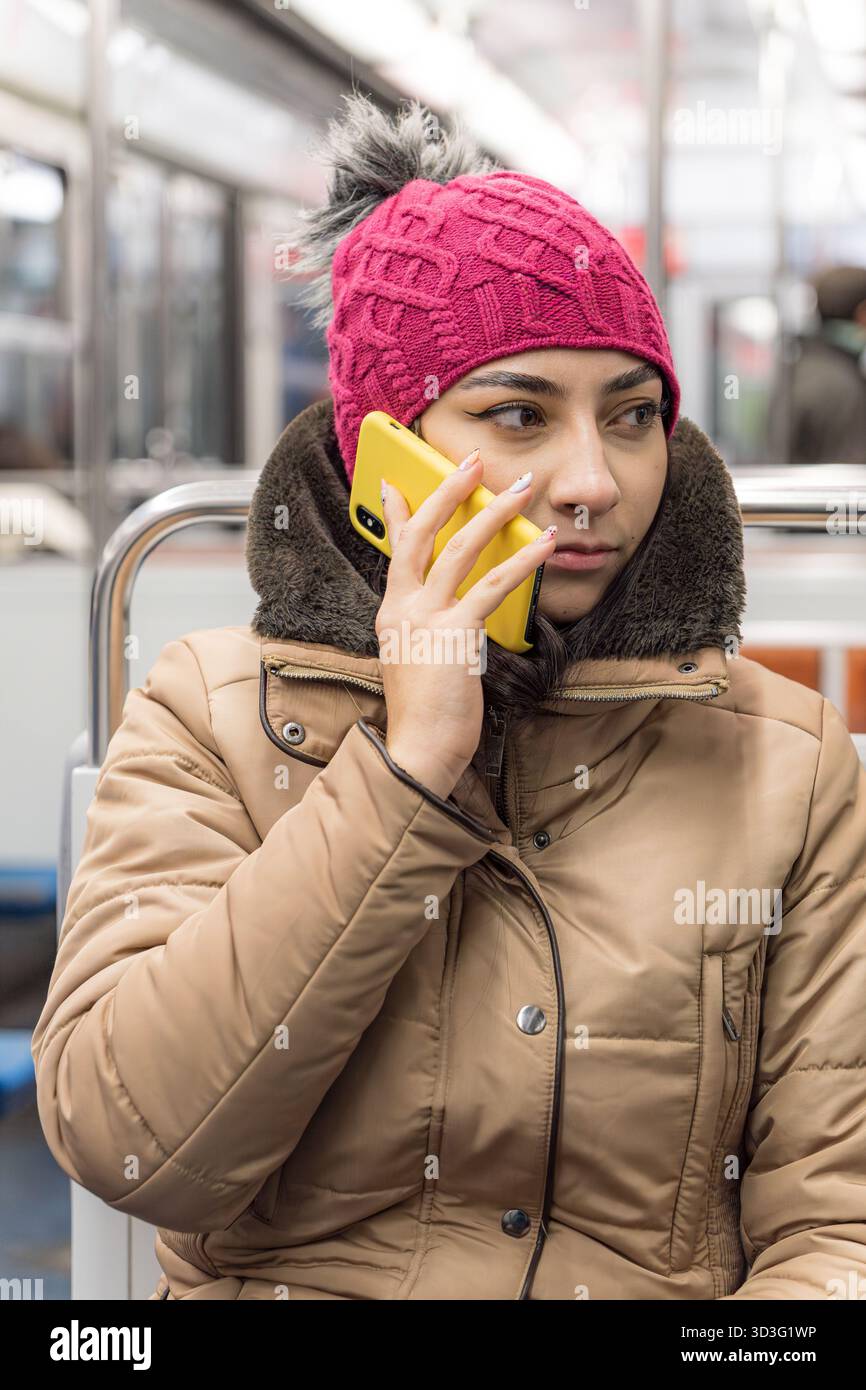 Woman wearing beige coat hi-res stock photography and images - Alamy