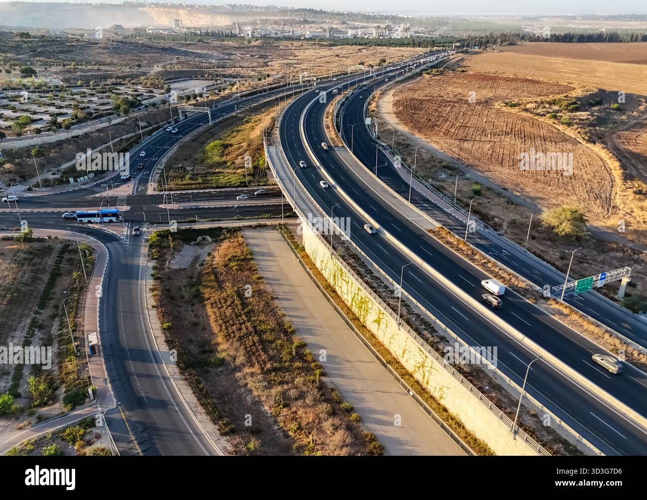 Aerial view of the highway road 6 cutting through the arid landscape ...
