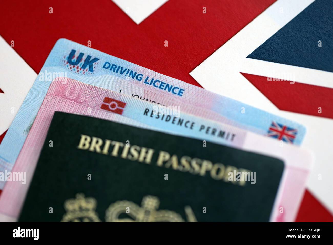 United Kingdom driving license with passport and residence permit card ...