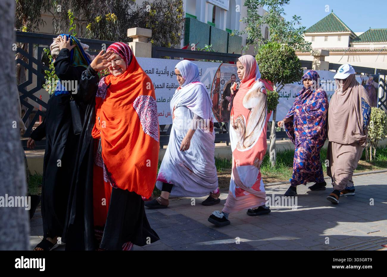 People take part in a parade commemorating the 50th anniversary of the ...