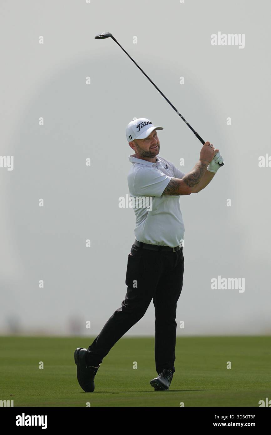 Andy Sullivan of England watches after playing his second shot on the ...