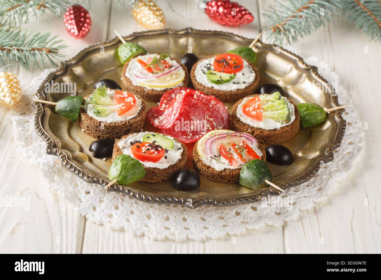 Christmas canapes decoration idea with cream cheese and vegetables ...