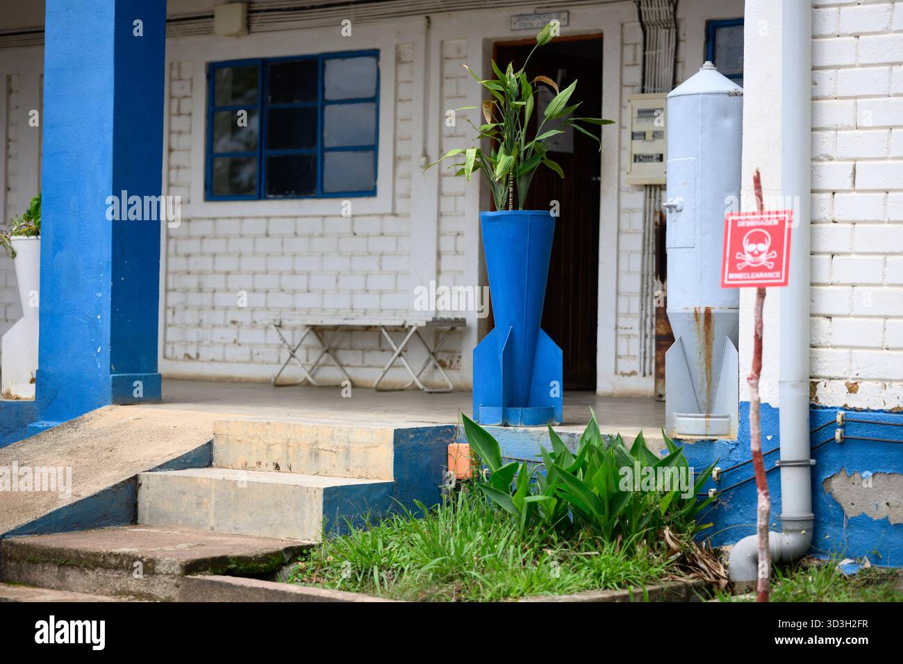 06 November 2025, Angola, Huambo: Flower pots made from former missiles ...