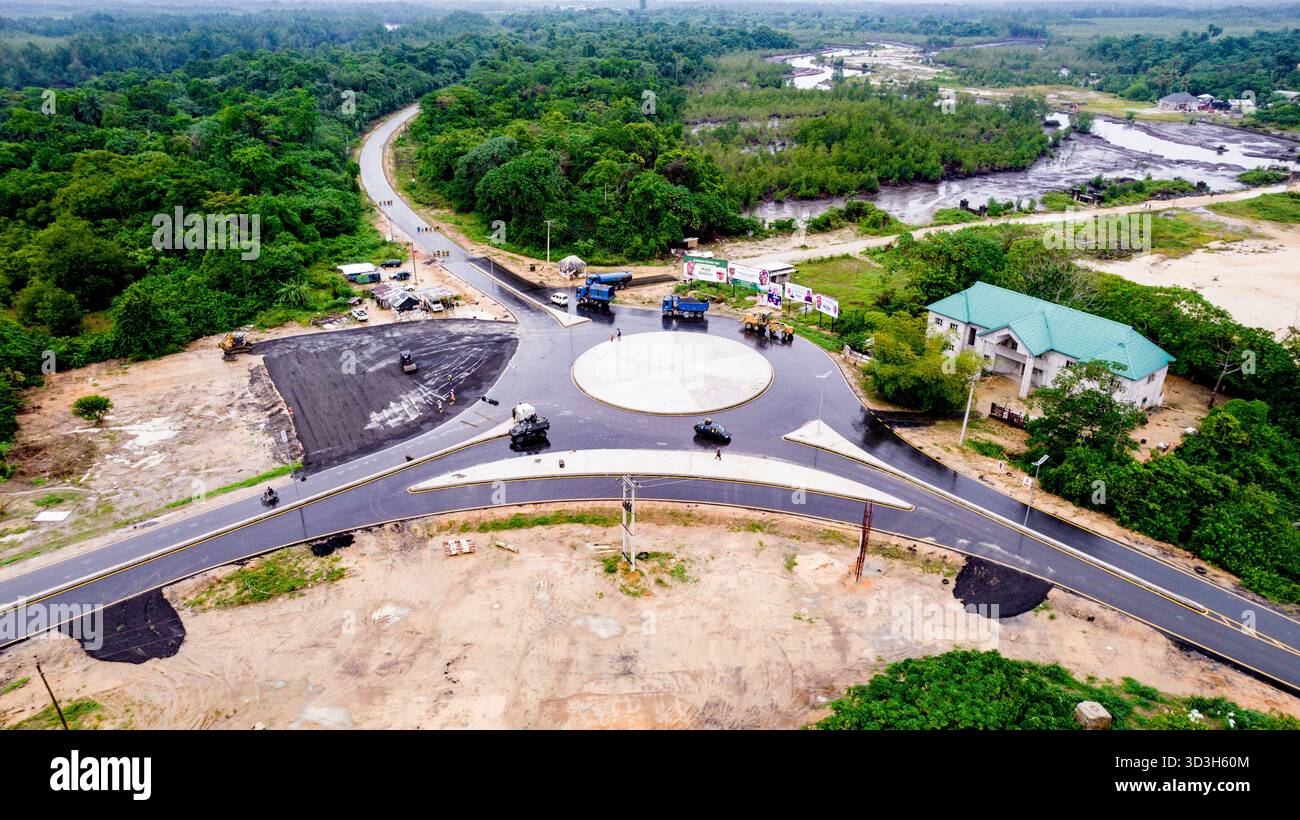 Aerial view of a roundabout glistening under the diffused light ...