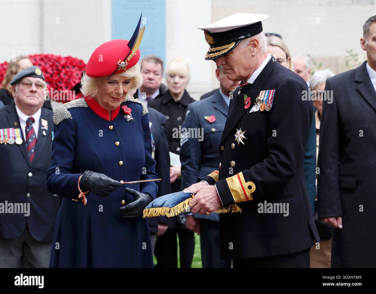 Queen Camilla and President of the Poppy Factory, Surgeon Rear Admiral ...