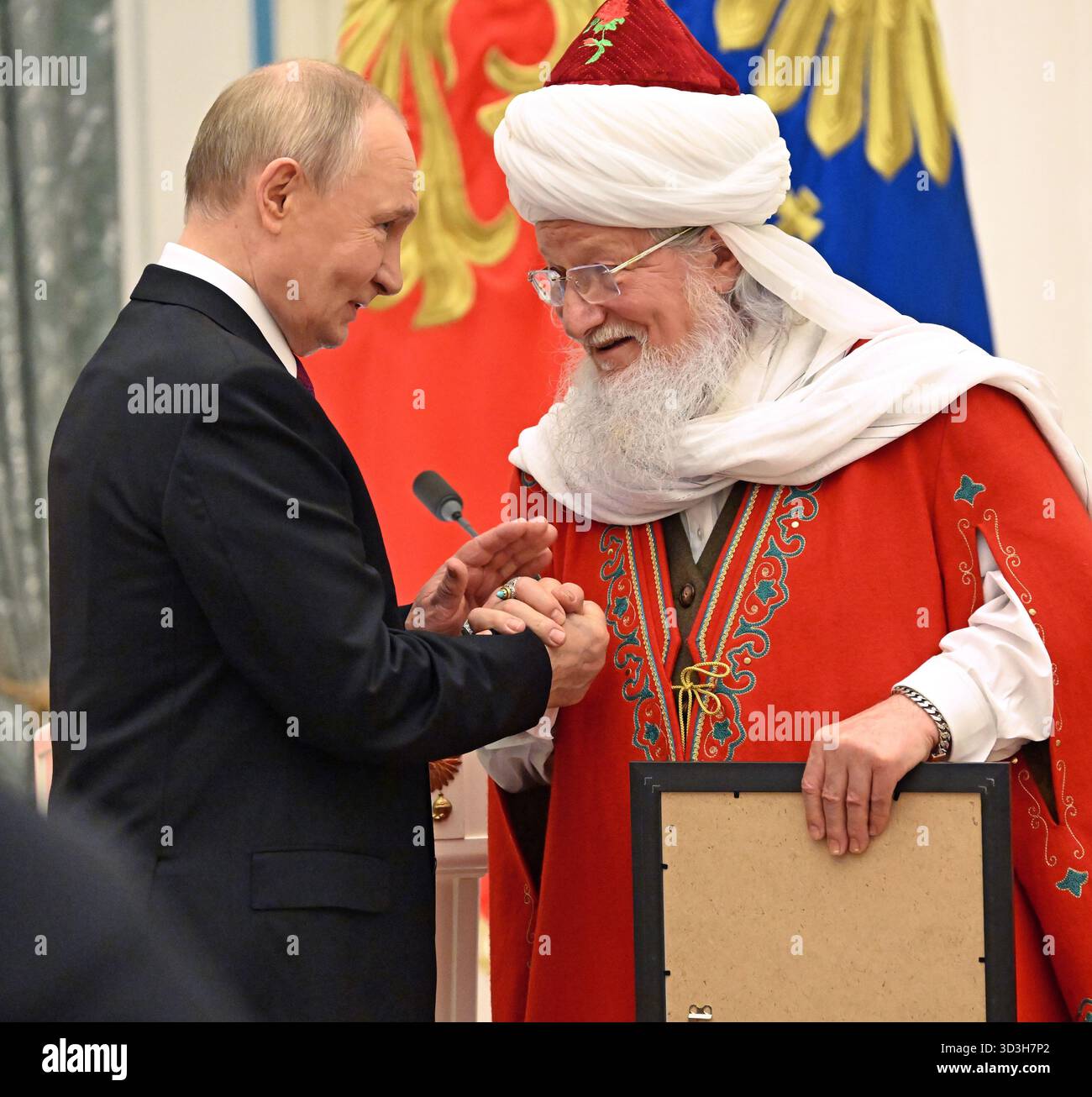 Russian President Vladimir Putin (left) and Chairman of the Central ...
