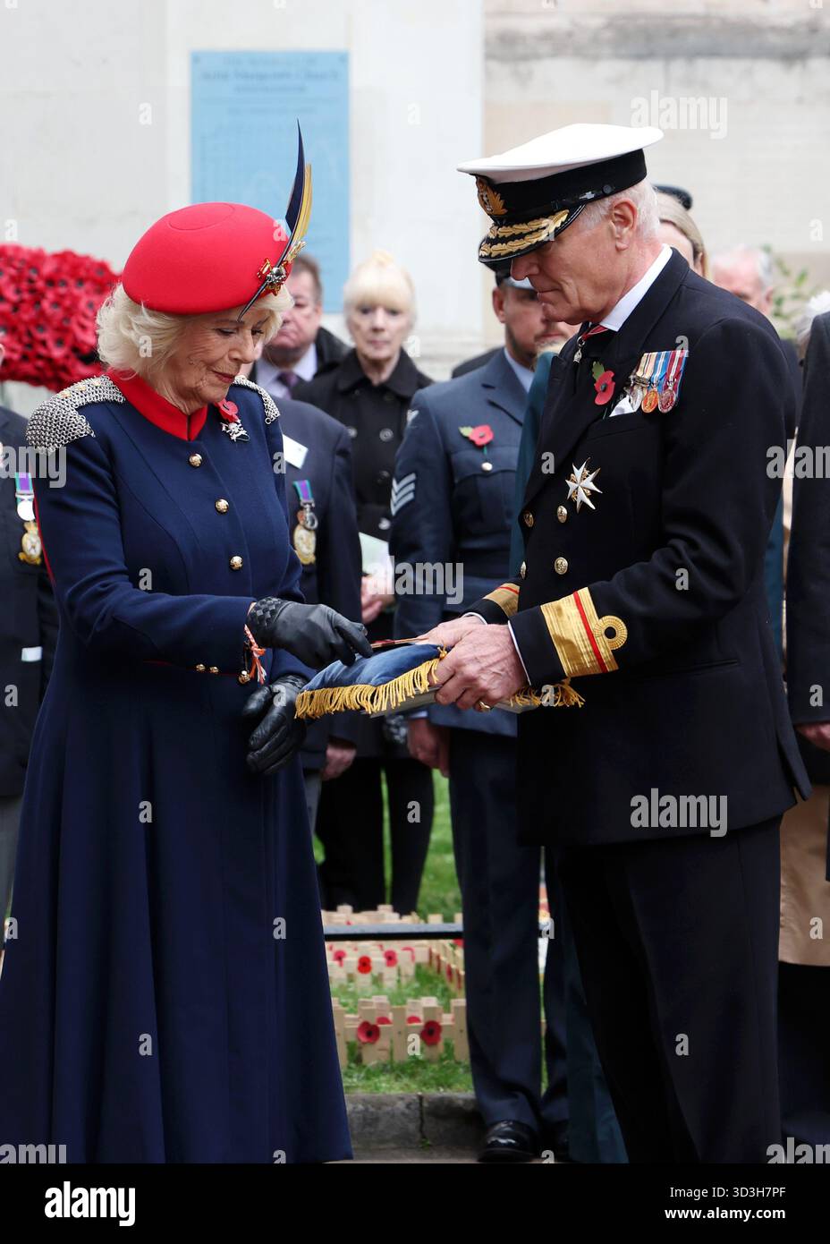 Queen Camilla and President of the Poppy Factory, Surgeon Rear Admiral ...
