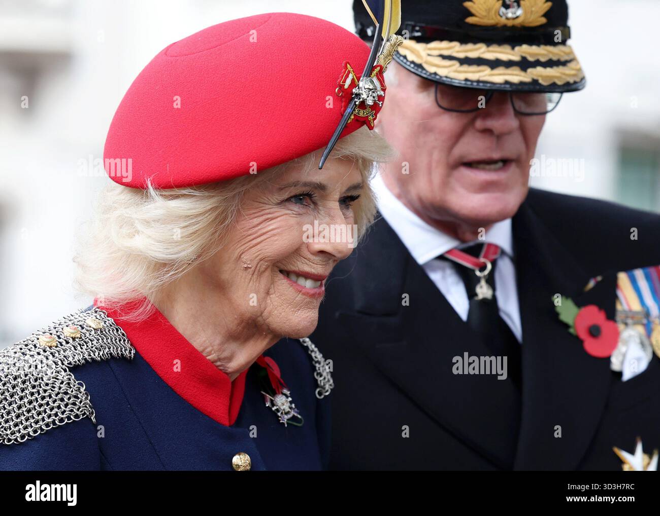 Queen Camilla and President of the Poppy Factory, Surgeon Rear Admiral ...