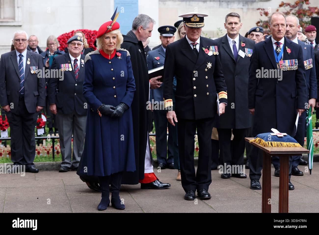 Queen Camilla and President of the Poppy Factory, Surgeon Rear Admiral ...