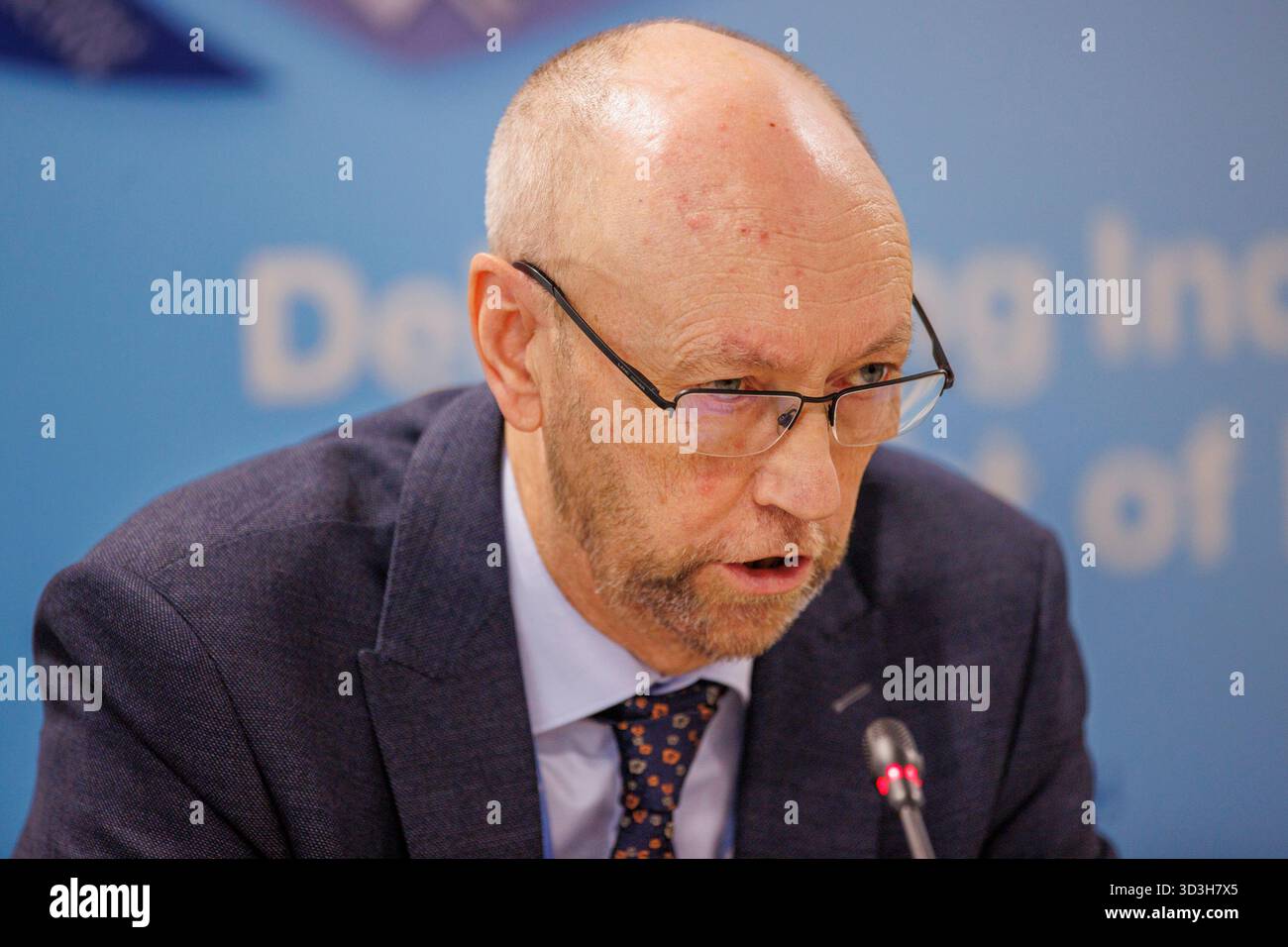 Northern Ireland Policing Board Vice Chair Brendan Mullan speaks during ...