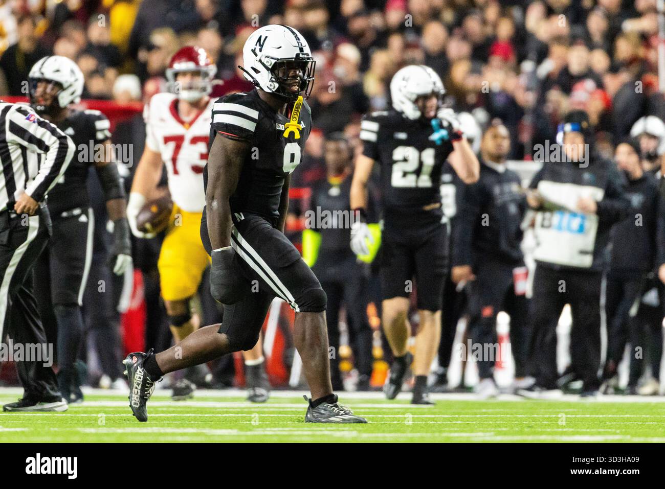 Nebraska linebacker Vincent Shavers Jr. (9) reacts after collecting a ...