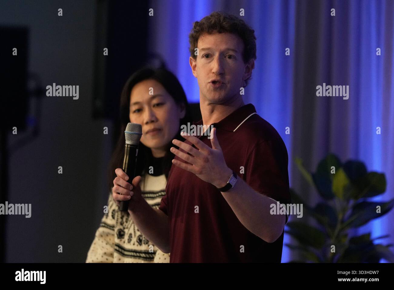 Meta CEO Mark Zuckerberg, right, speaks next to his wife, Priscilla ...