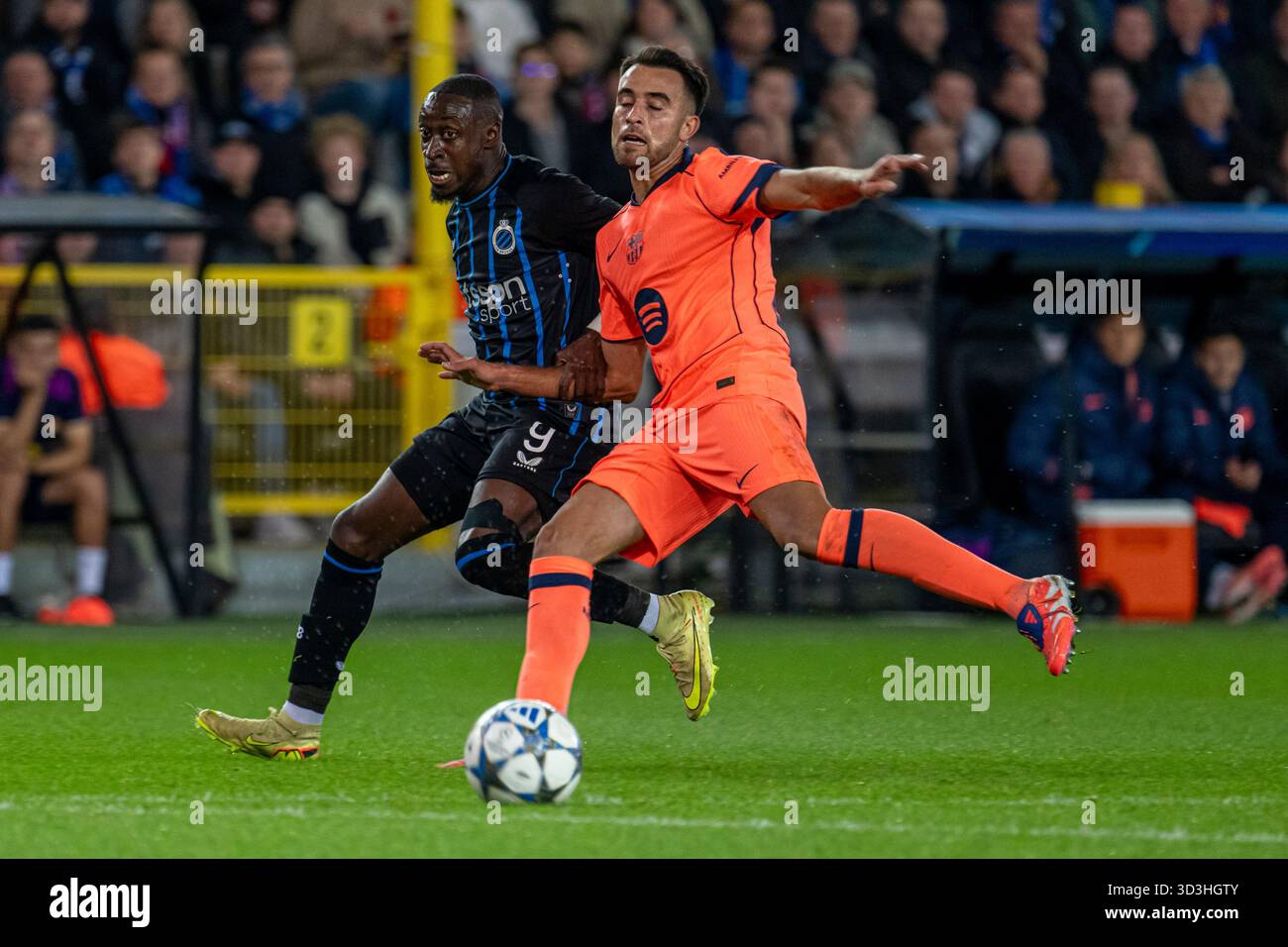 Carlos Forbs of Club Brugge and Eric García of Barcelona fight for the ...