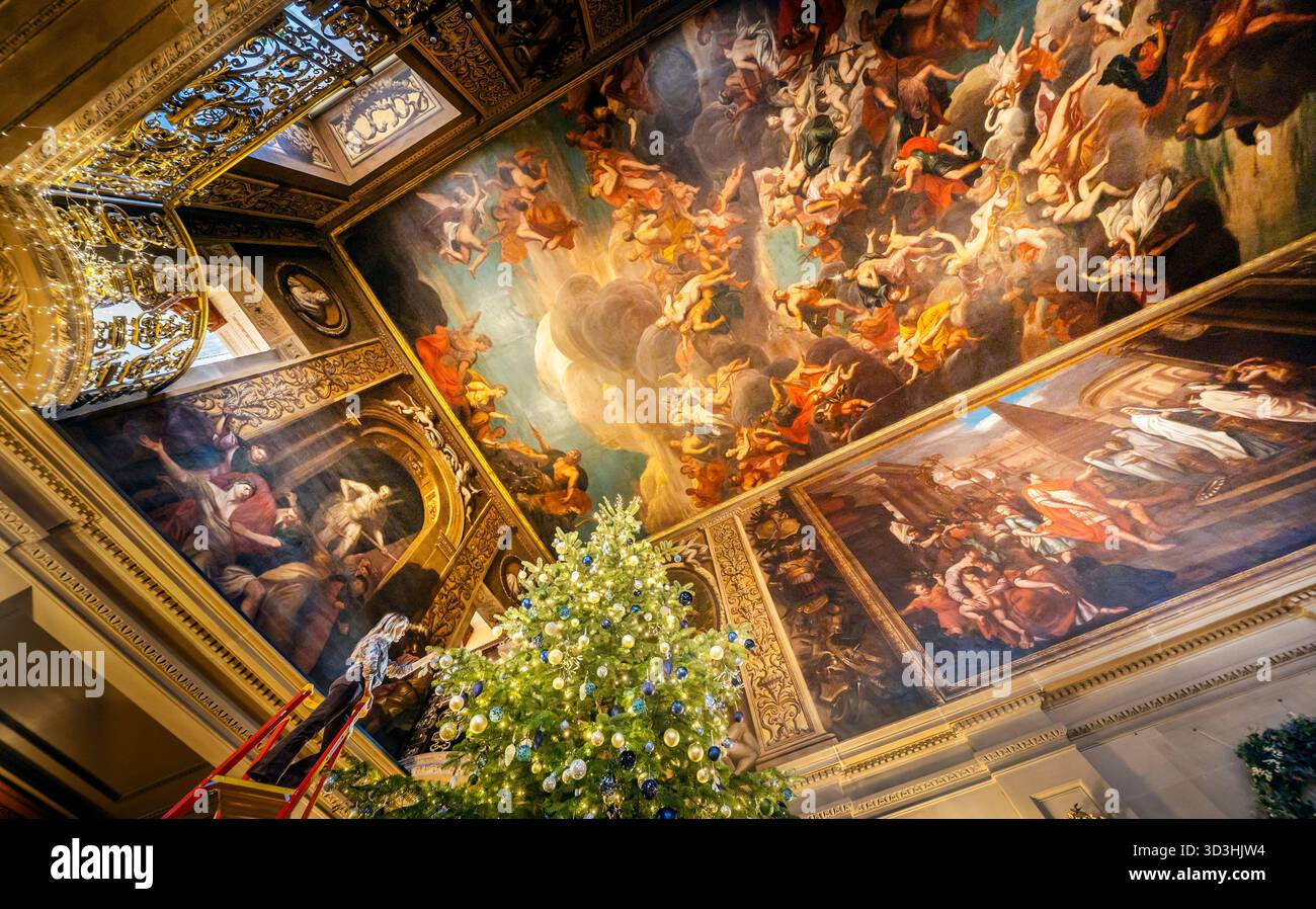 Olivia Housley puts the finishing touches to a Christmas tree in the ...