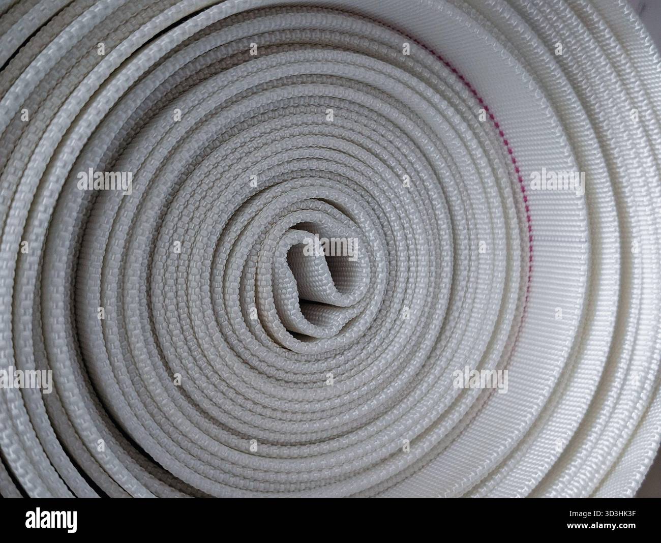 Fire hose coiled circle hi-res stock photography and images - Alamy